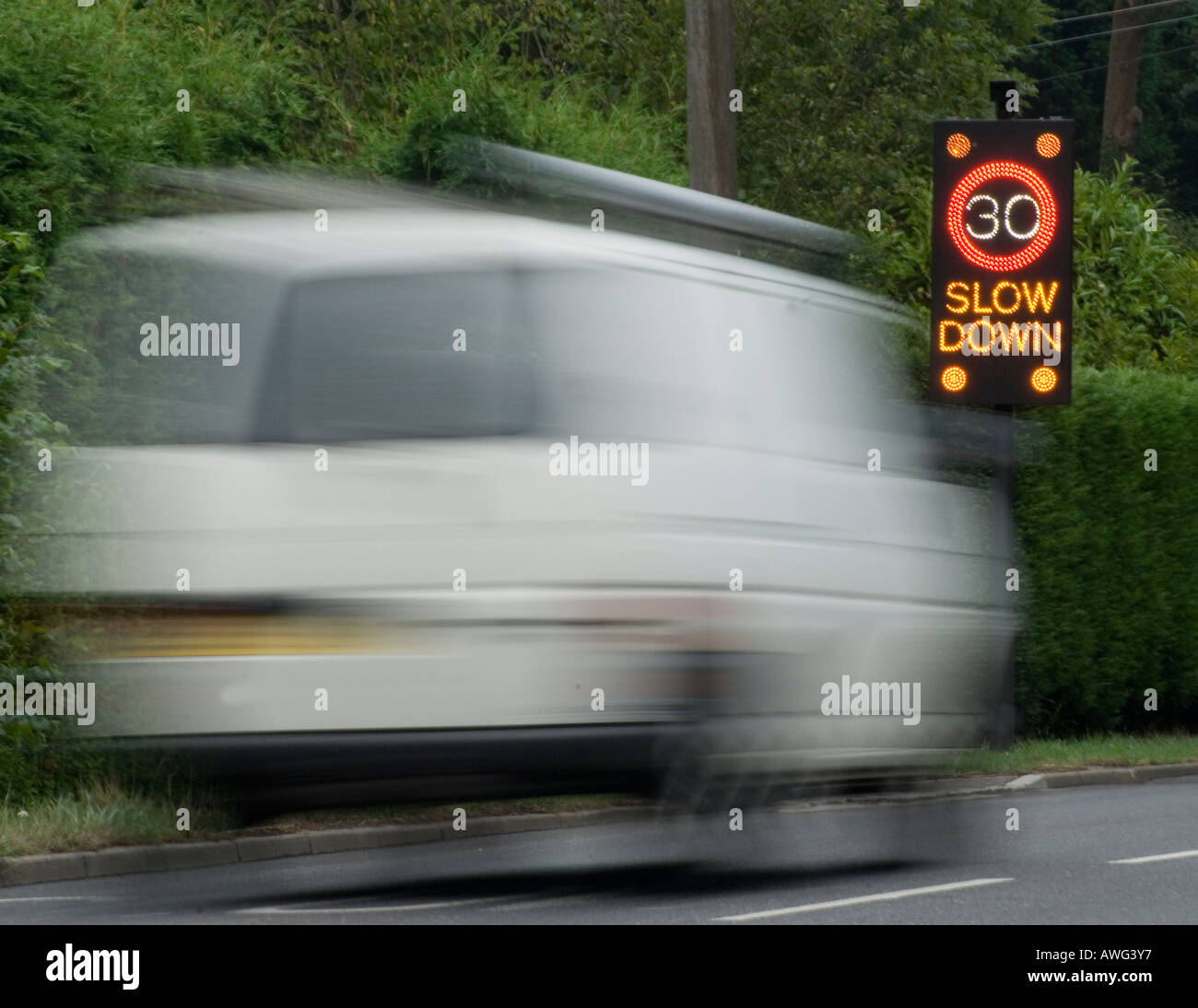 Car moving past 30 MPH illuminated speed limit reminder A2100 Battle ...