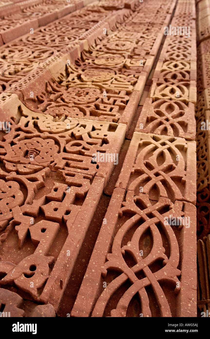 Detail of ornate carved stonework of the Quwwat ul-Islam Mosque Stock ...