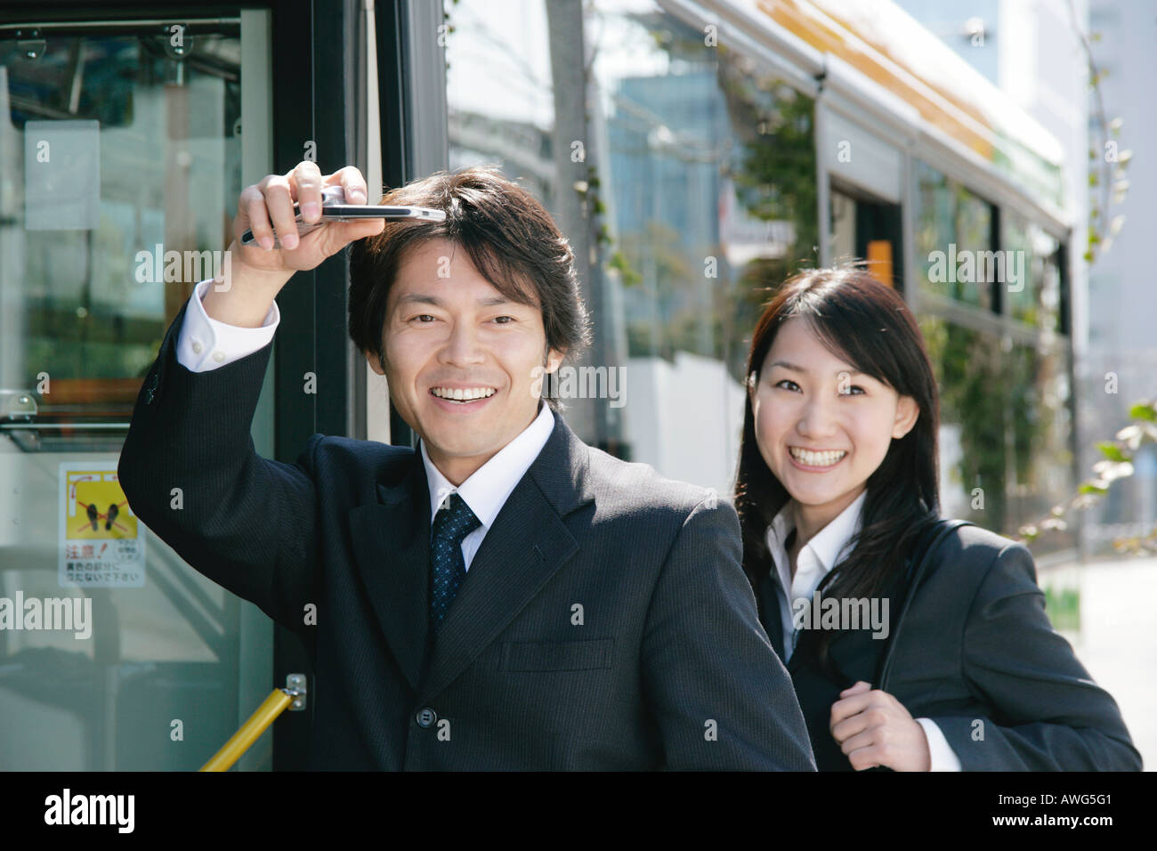 Person people getting on a bus hi-res stock photography and images - Alamy