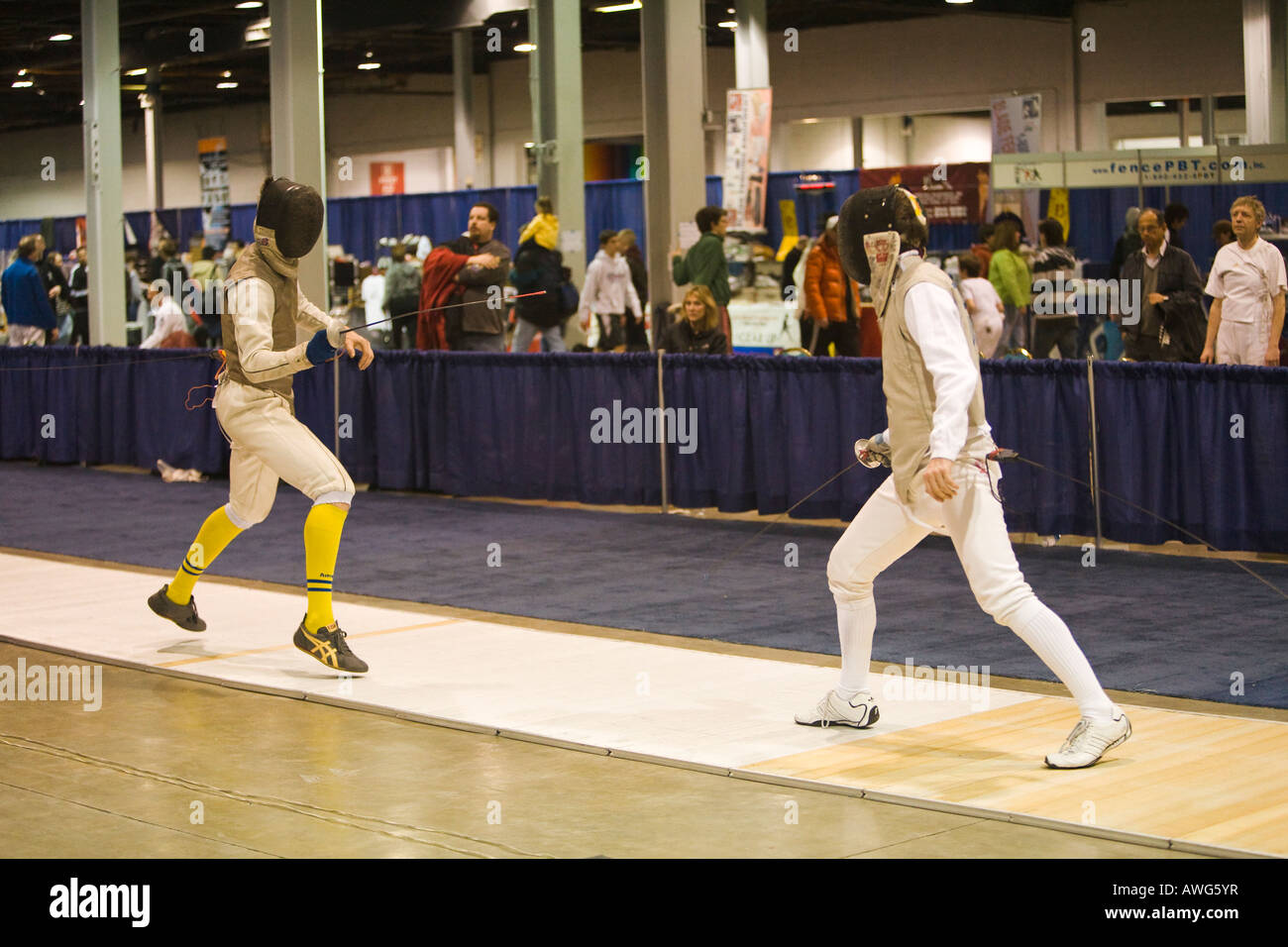 SPORTS Fencing competition bout male foil competitors on strip during ...
