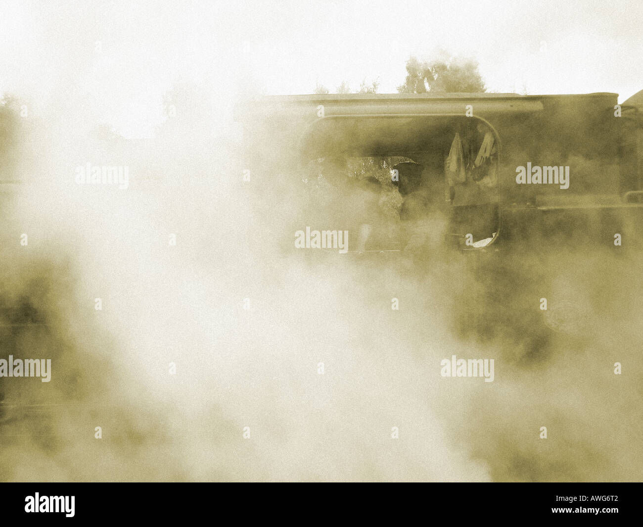 Nostalgic steam train scene of driver and engine Stock Photo - Alamy