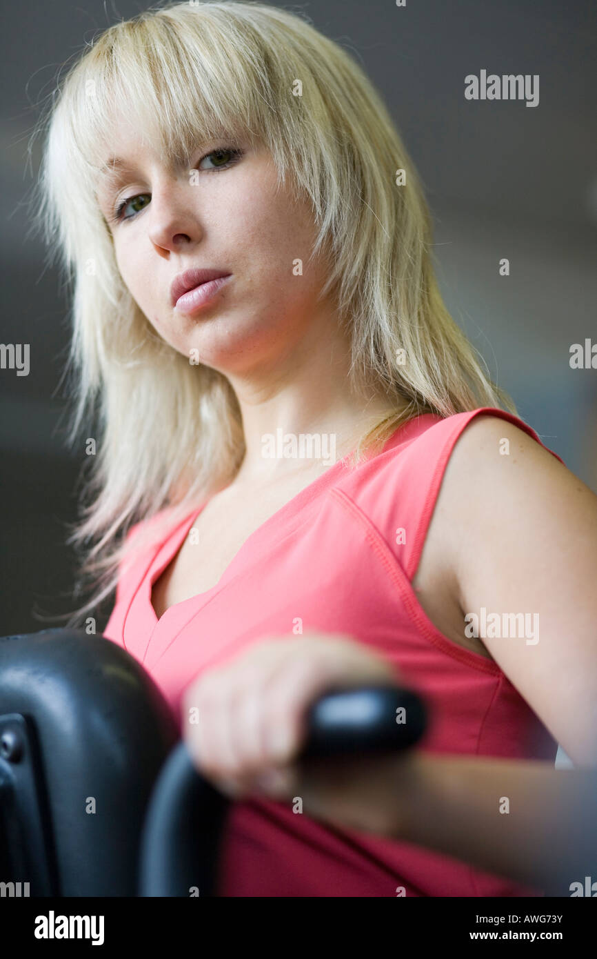 blonde woman trains her upper back Stock Photo - Alamy