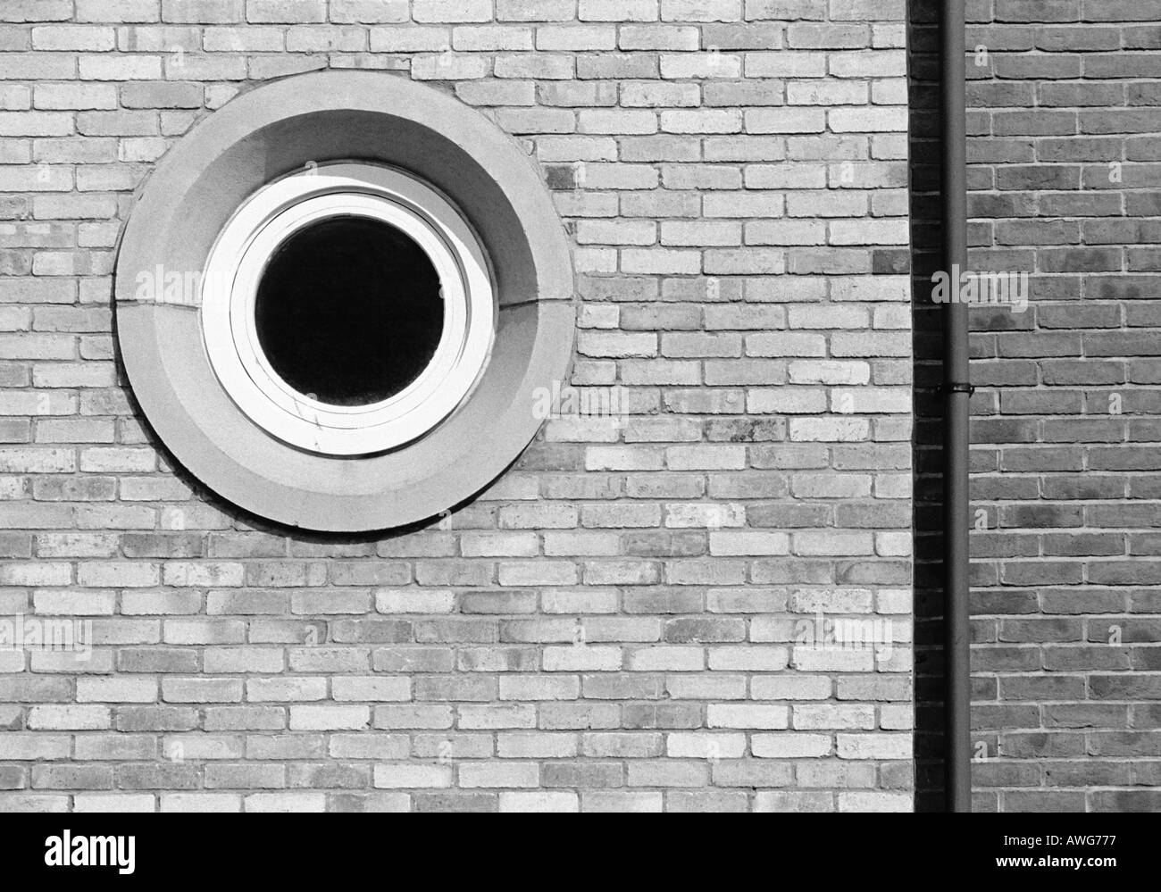 Round window in modern brick building UK Stock Photo - Alamy