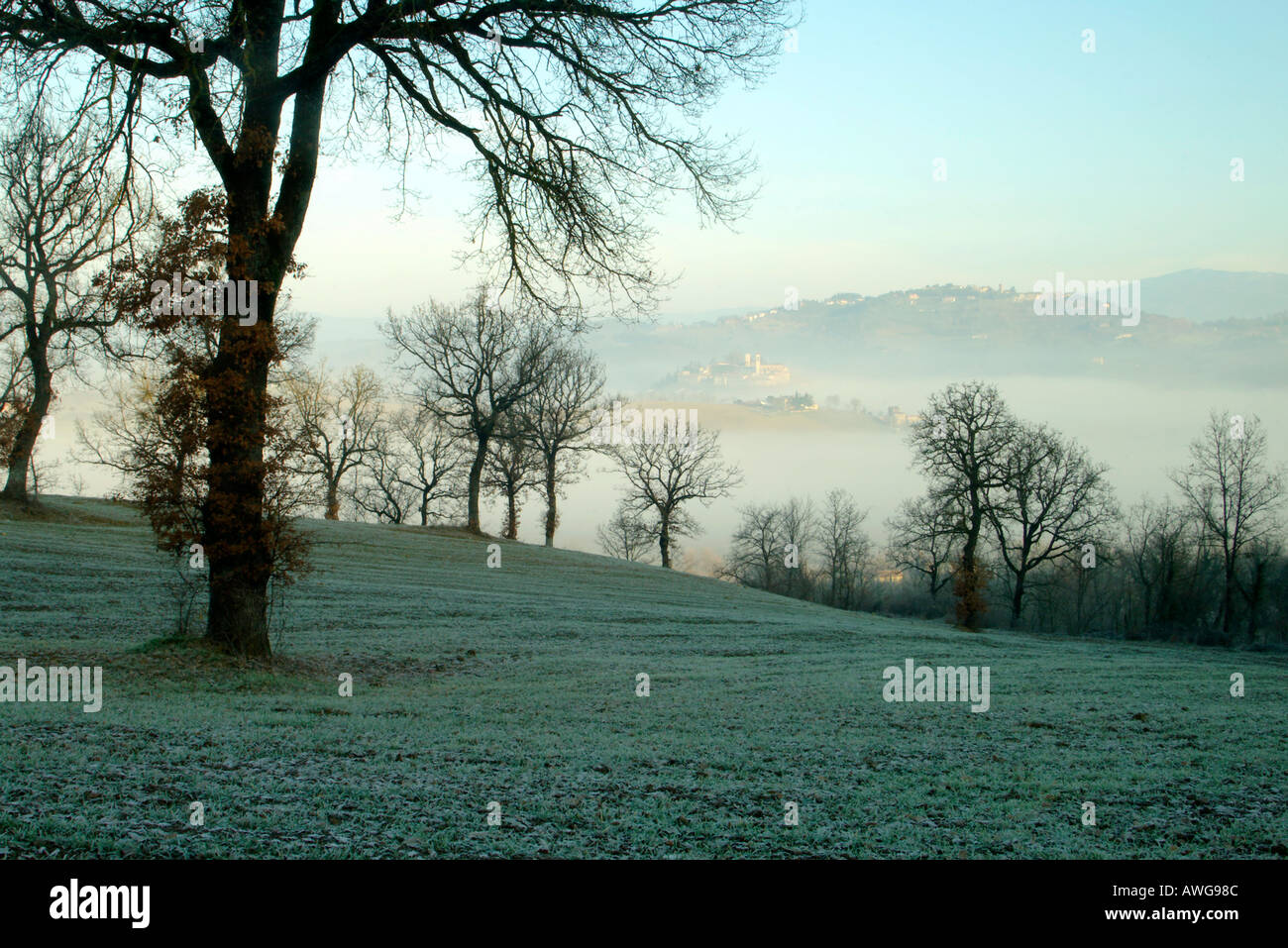 Dawn mist on the border between Tuscany and Umbria Italy Stock Photo ...
