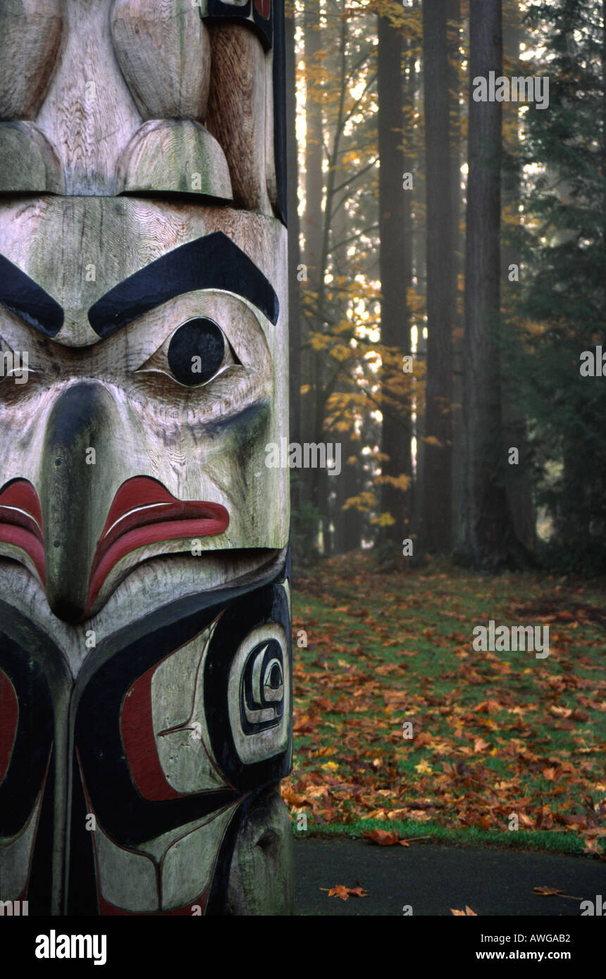 Fragment of a carved wood totem pole of NorthWest Native Americans in ...