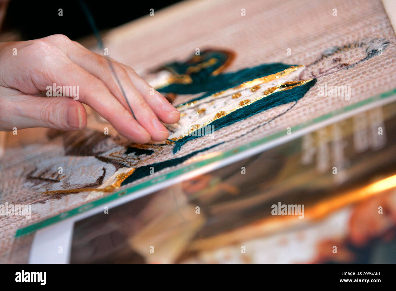 lady working tapestry Stock Photo - Alamy