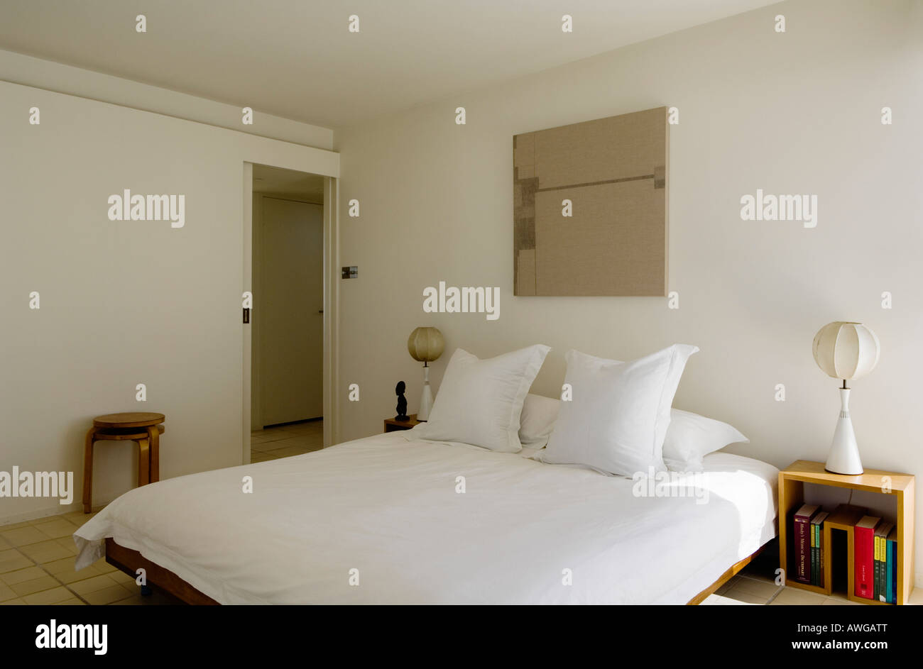 simple bedroom in white Stock Photo - Alamy