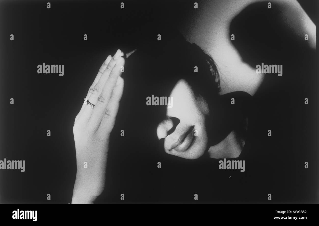 Hand cover eyes Black and White Stock Photos & Images - Alamy