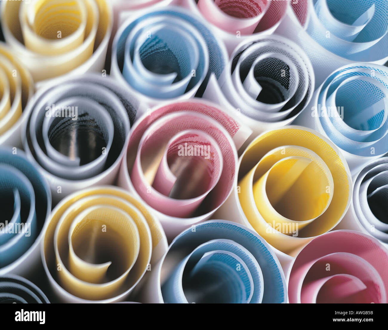 Scrolls of printing papers CMYK Stock Photo - Alamy