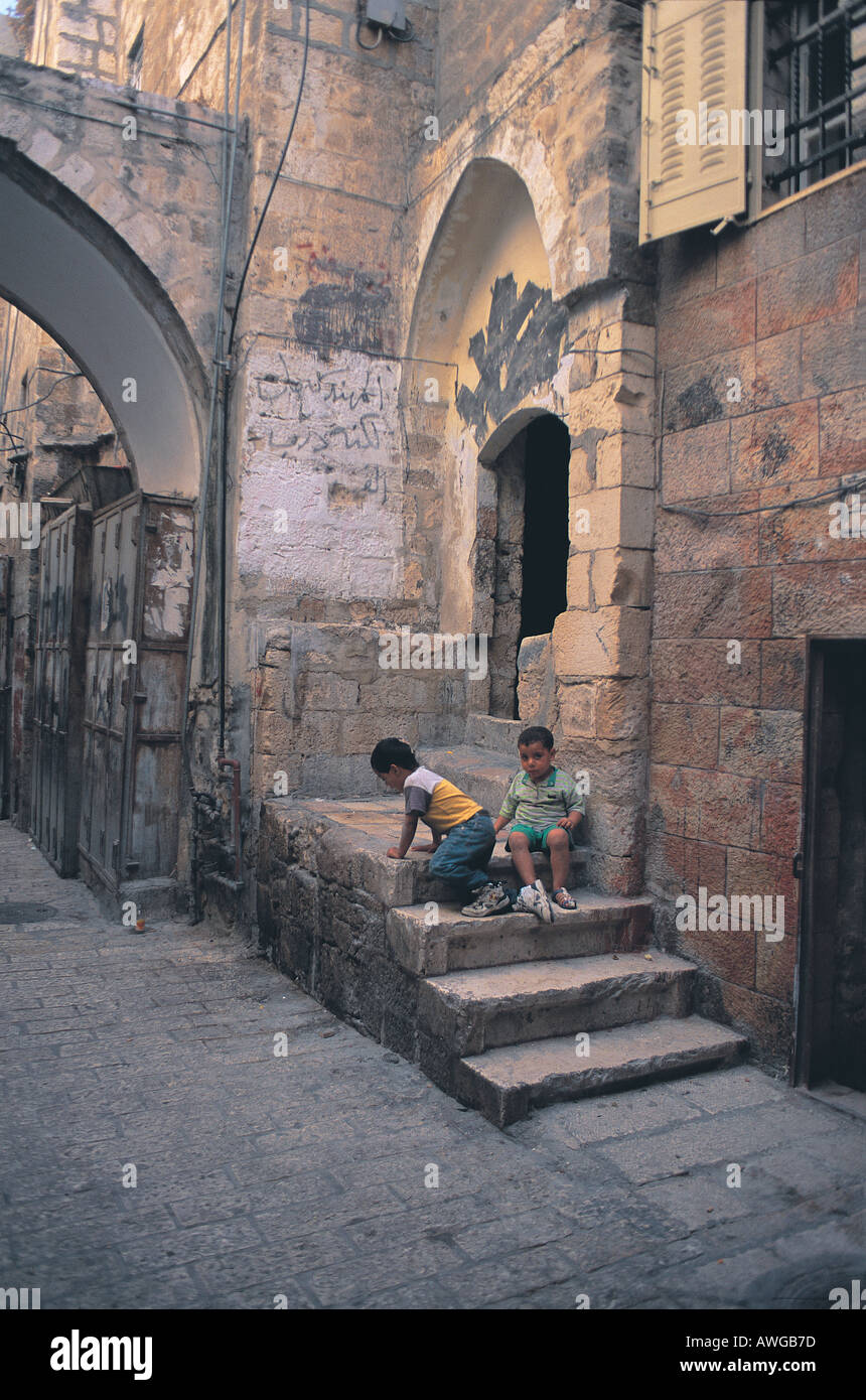 Two small children playing on steps Jerusalem Israel Stock Photo - Alamy