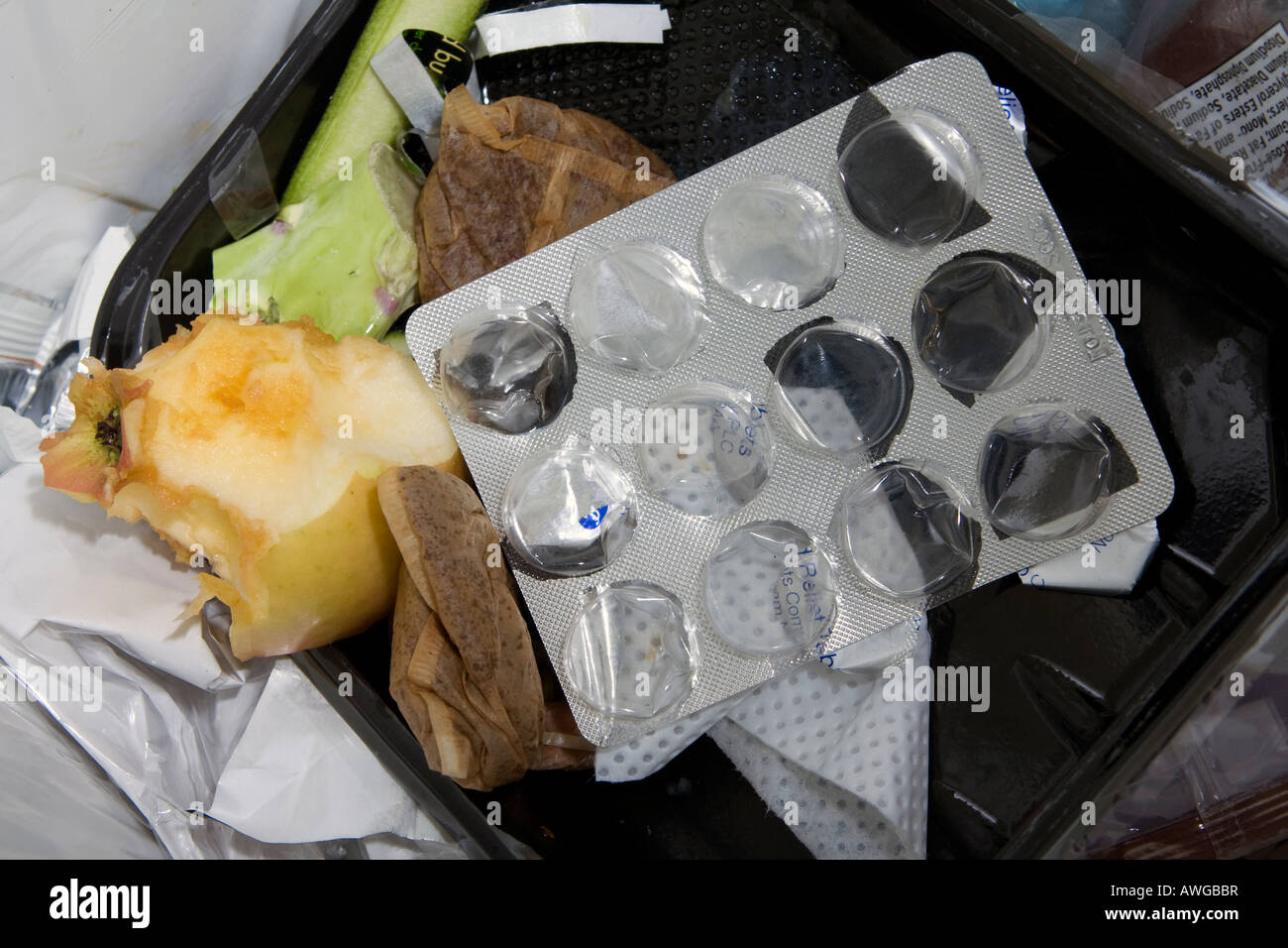 Rubbish in bin Stock Photo - Alamy