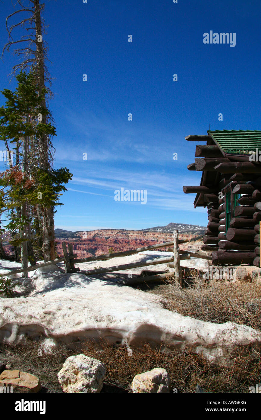 Log Cabin Style Visitor Center with Snow and Pine Trees at Cedar Breaks ...