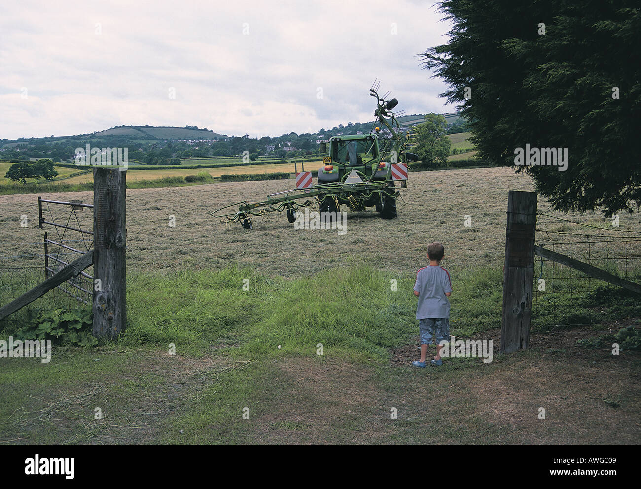 Boy Farming In Field With Tractor High Resolution Stock Photography and ...