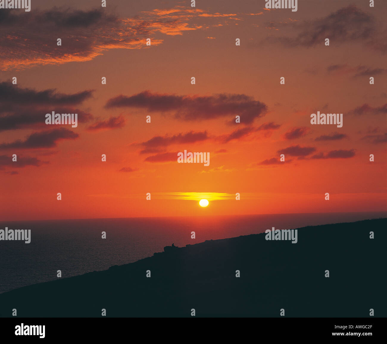 The sun setting Stock Photo - Alamy