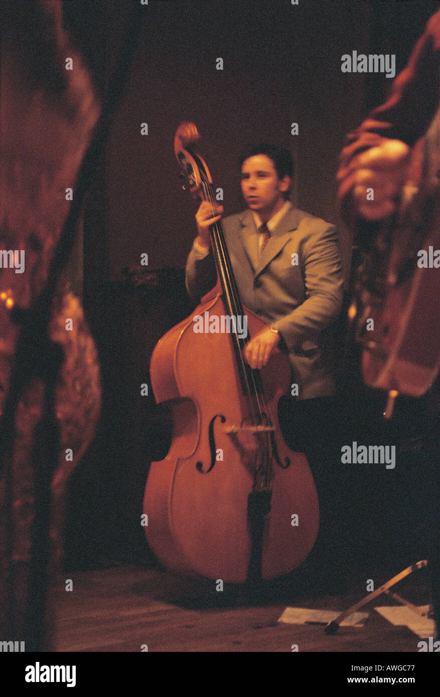 A man playing a double bass Stock Photo - Alamy