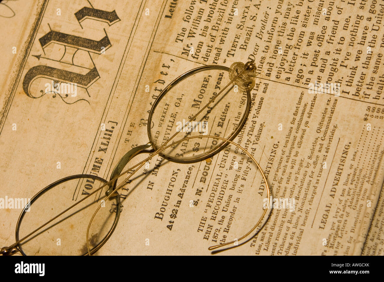 Antique Newspaper with Eyeglasses Stock Photo - Alamy