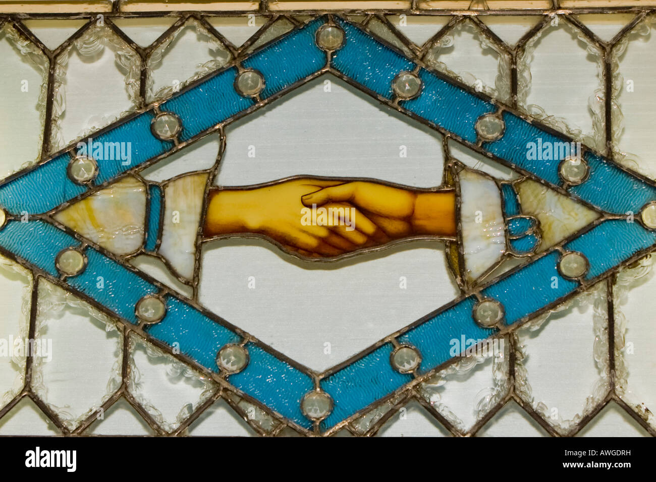 Stained Glass Window of Shaking Hands Stock Photo - Alamy