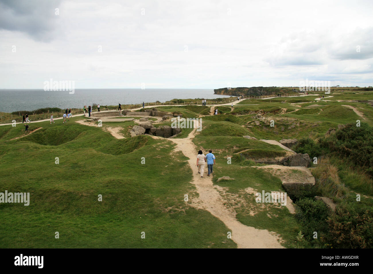 An open gun position and concrete shelters surrounded by bamb craters ...