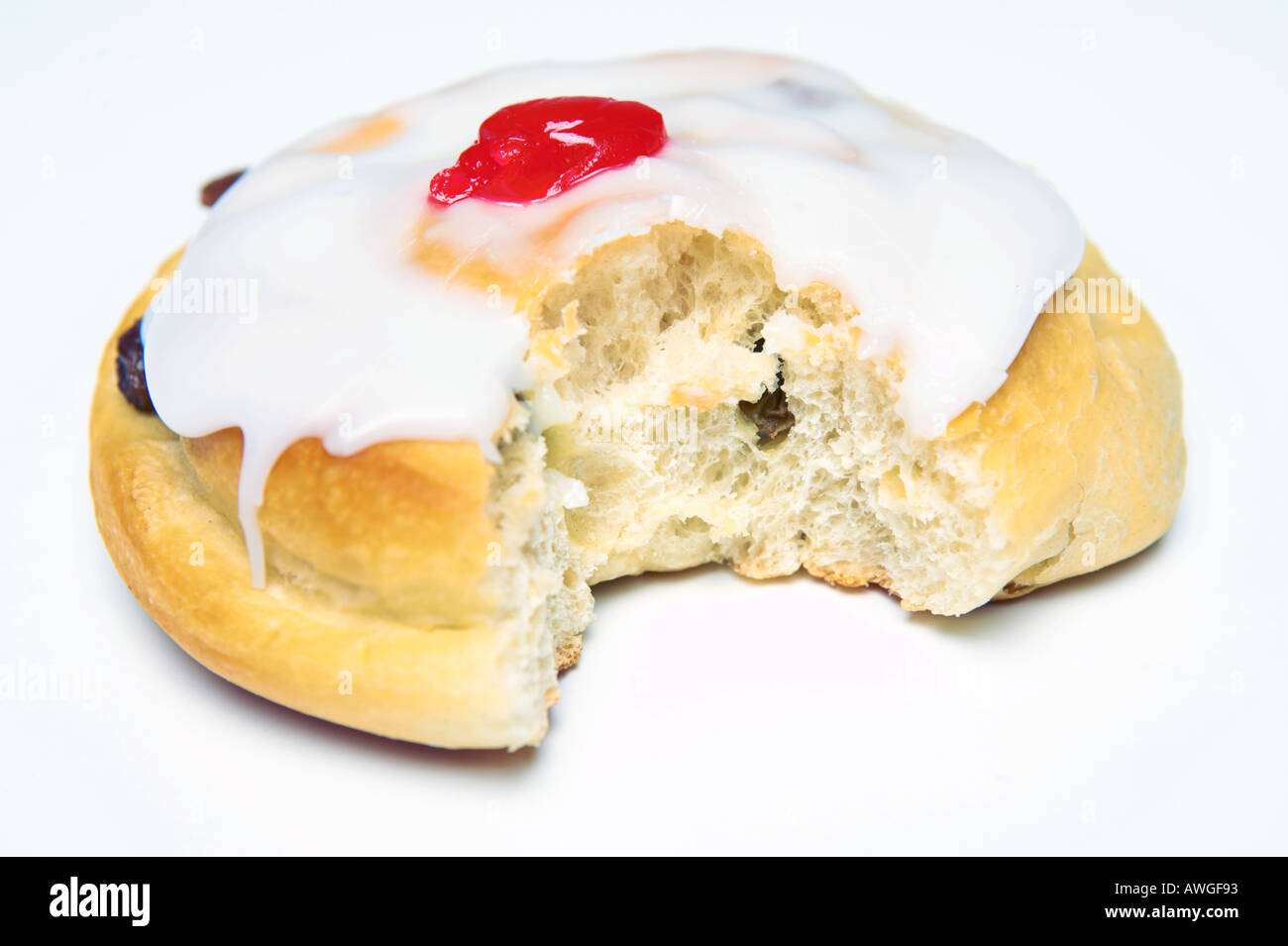 Belgian pastry bun icing and cherry Stock Photo - Alamy
