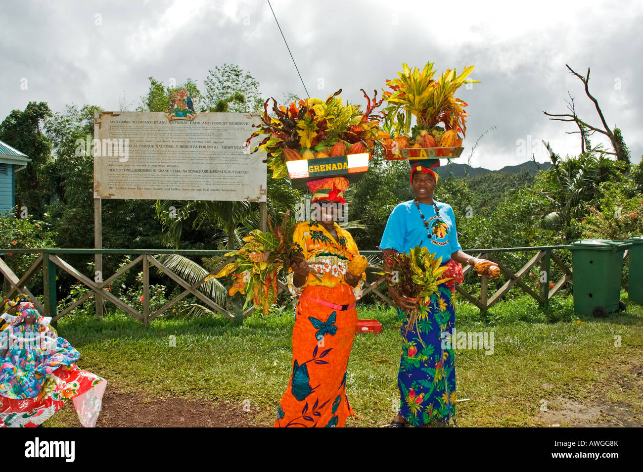 Two Colourful Grenada Women display Local Produce on their Heads, Grand ...