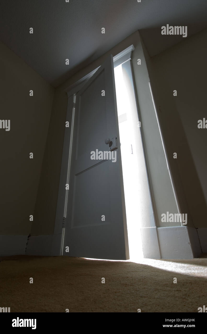 Door slightly ajar light hi-res stock photography and images - Alamy