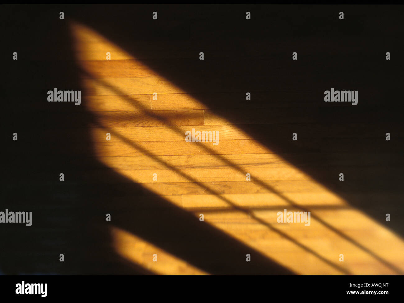 Shadow patterns on hard wood flooring floor Stock Photo - Alamy