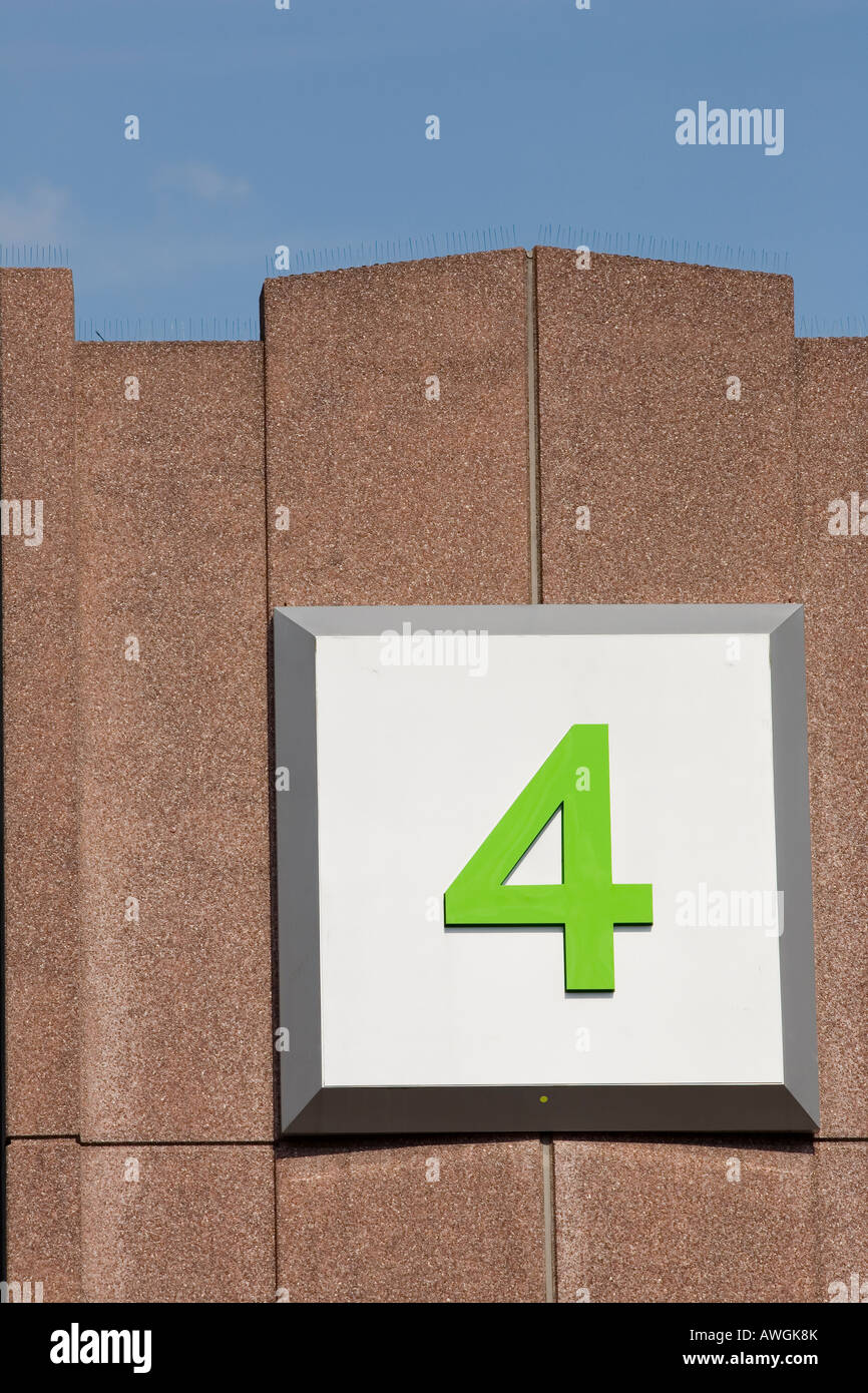 green number four on a building Stock Photo - Alamy