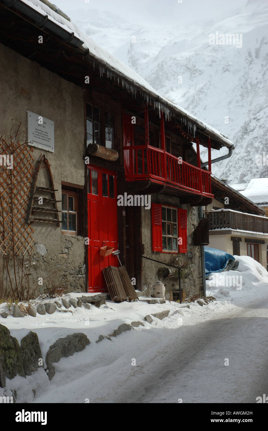 Red alps cottage Stock Photo - Alamy