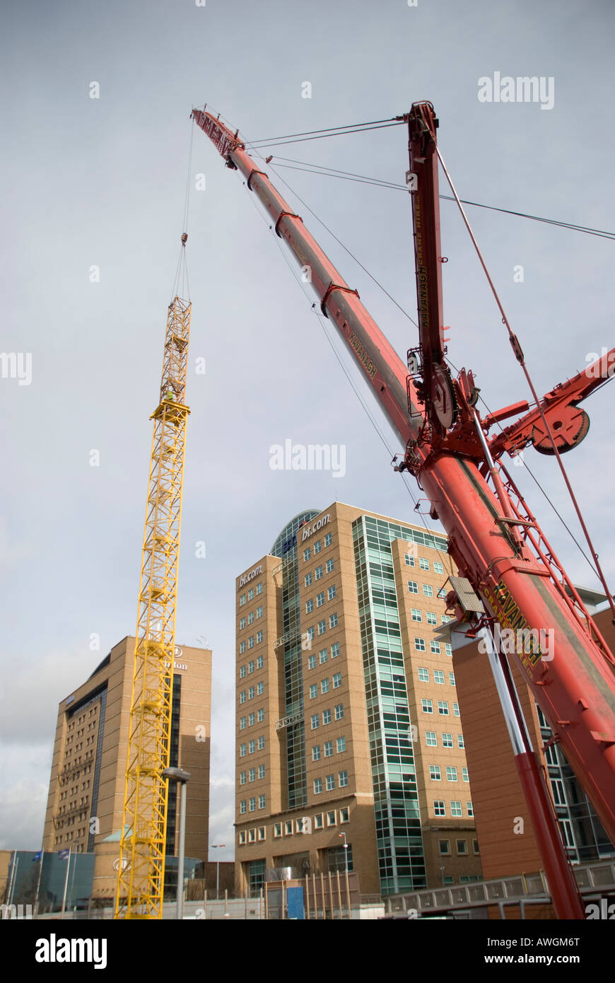 Crane being erected at building site in Belfast Stock Photo - Alamy