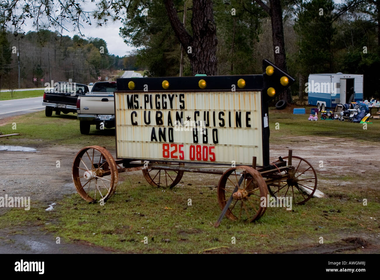 Old Restaurant Sign with Wagon Wheels Stock Photo - Alamy