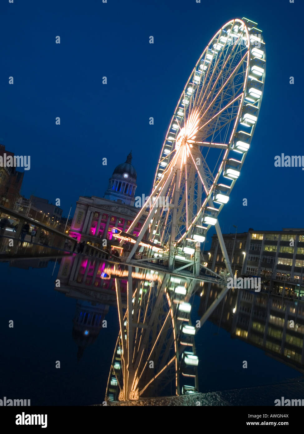 A mirror image reflection of the Council House and Nottingham Eye, in ...
