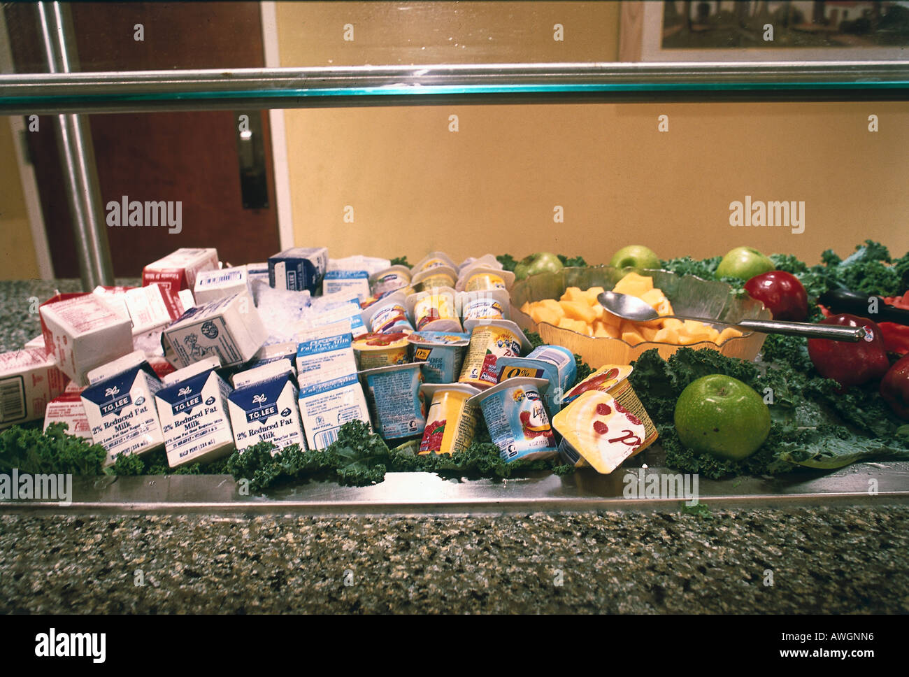 Buffet breakfast counter featuring cartons of milk hi-res stock ...
