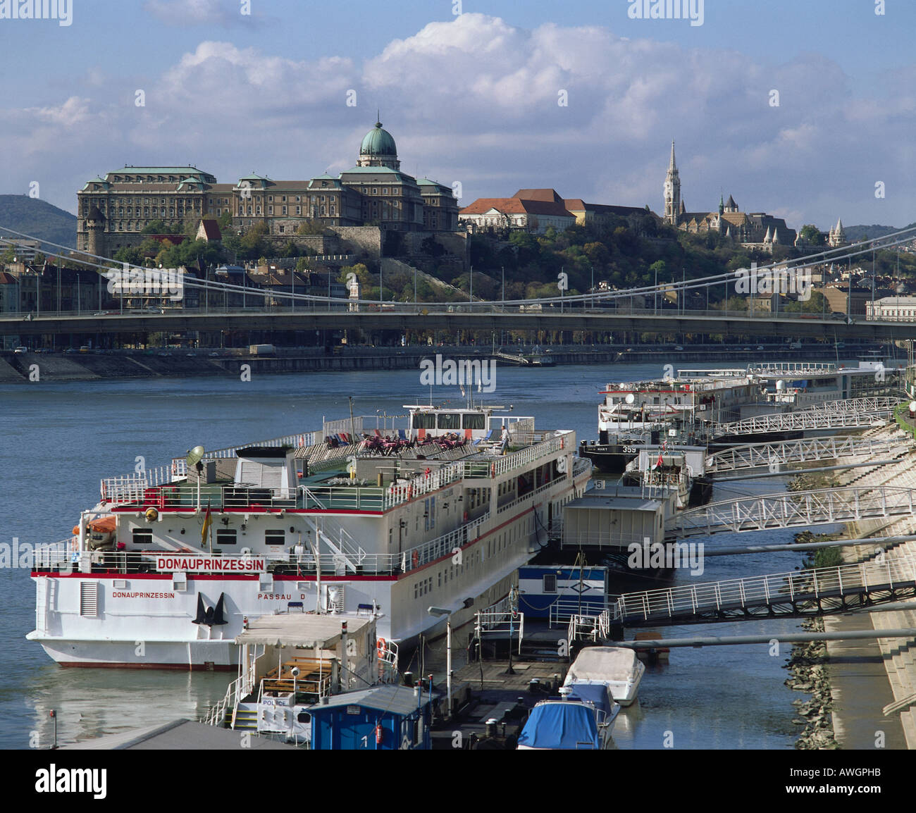 Hungary, Budapest, River Danube cruise ship attached to pier overlooked ...