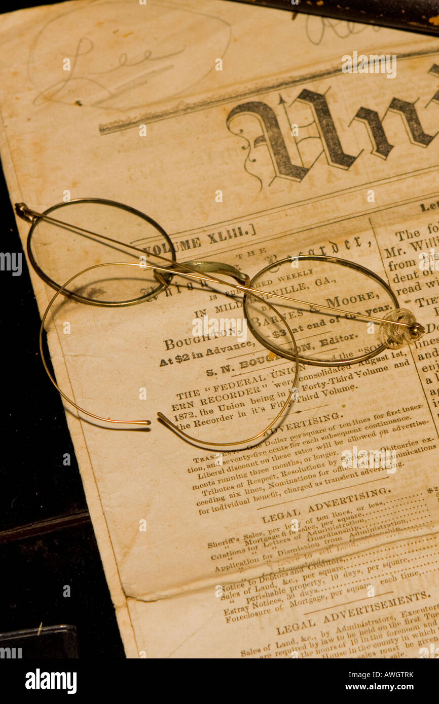 Antique Newspaper with Eyeglasses Stock Photo - Alamy
