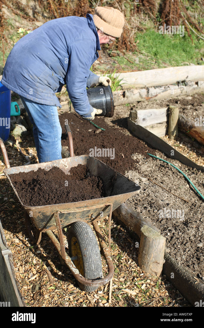 Applying mulch hi-res stock photography and images - Alamy