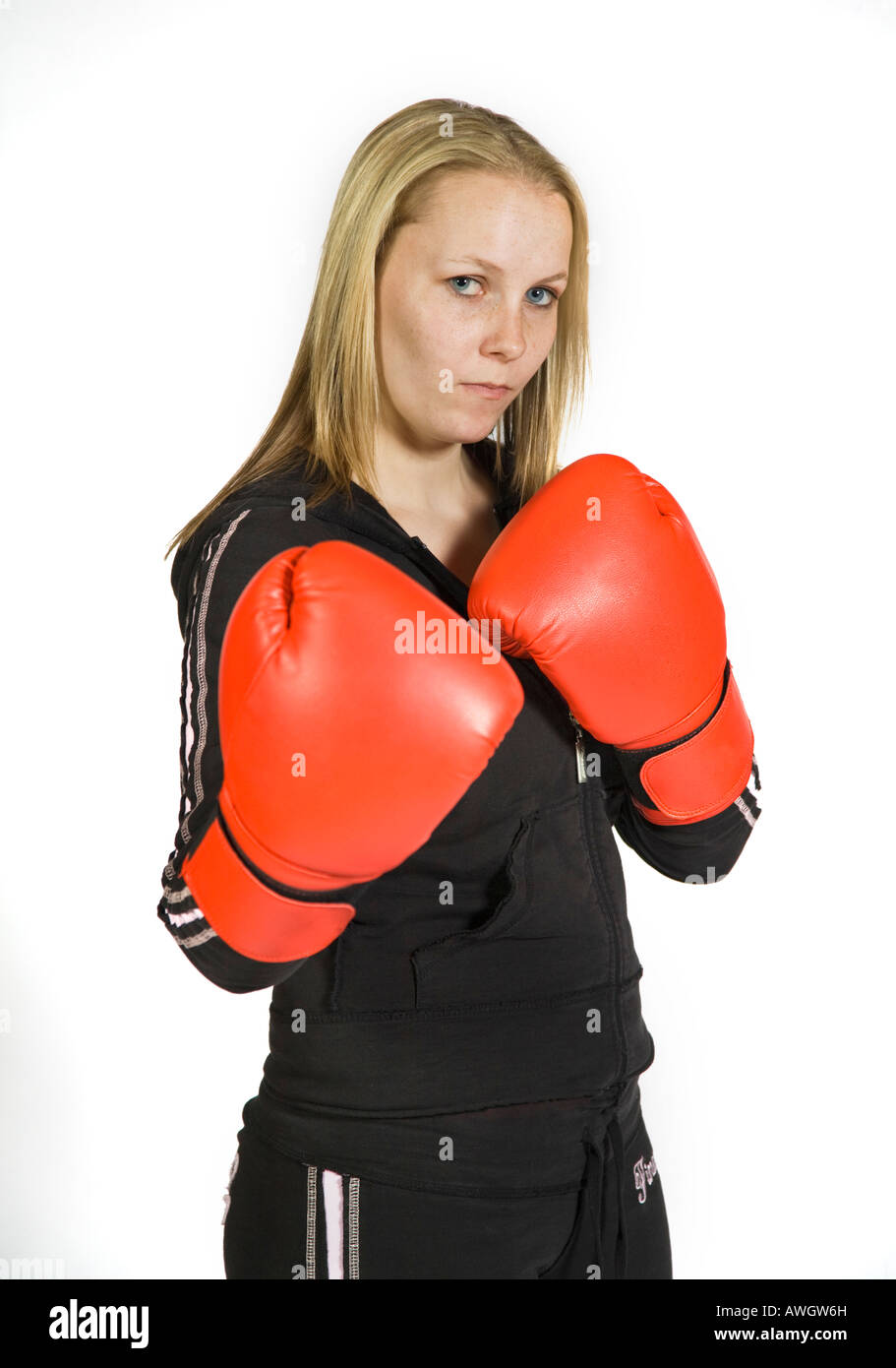 A woman boxer wearing a black track suit Stock Photo - Alamy
