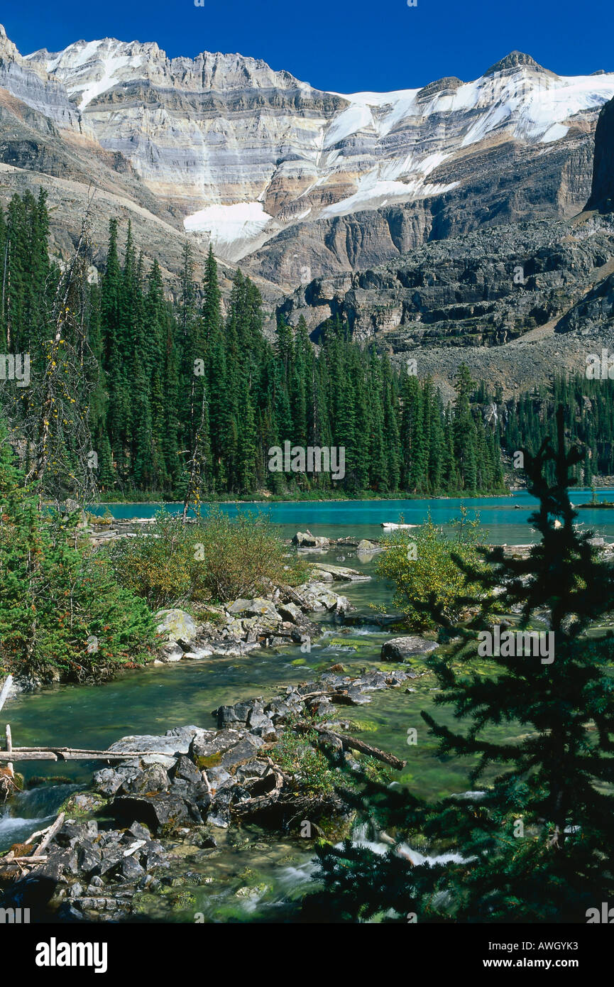 Shadowed by the majestic peaks of mount victoria and lefroy hi-res ...
