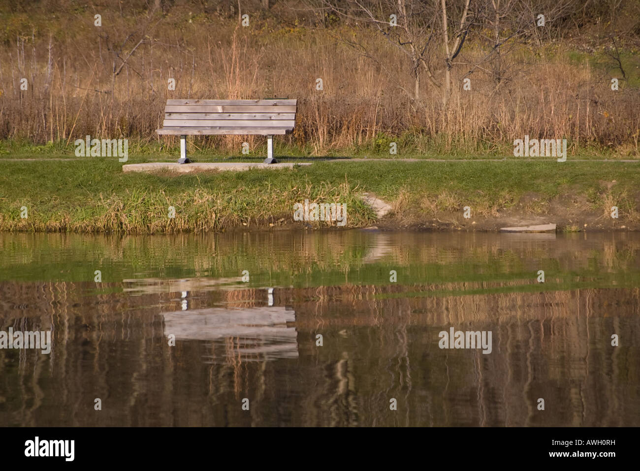 Empty bench on a sunny fall afternoon in southern Minnesota Stock Photo ...