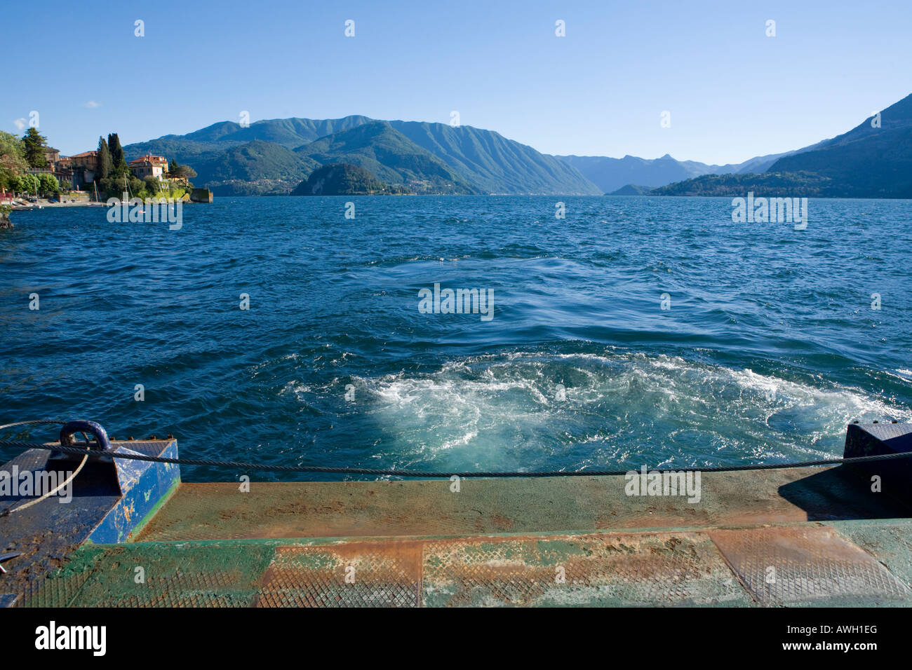 A view of Lake Como from the back of a car ferry from Menaggio to ...