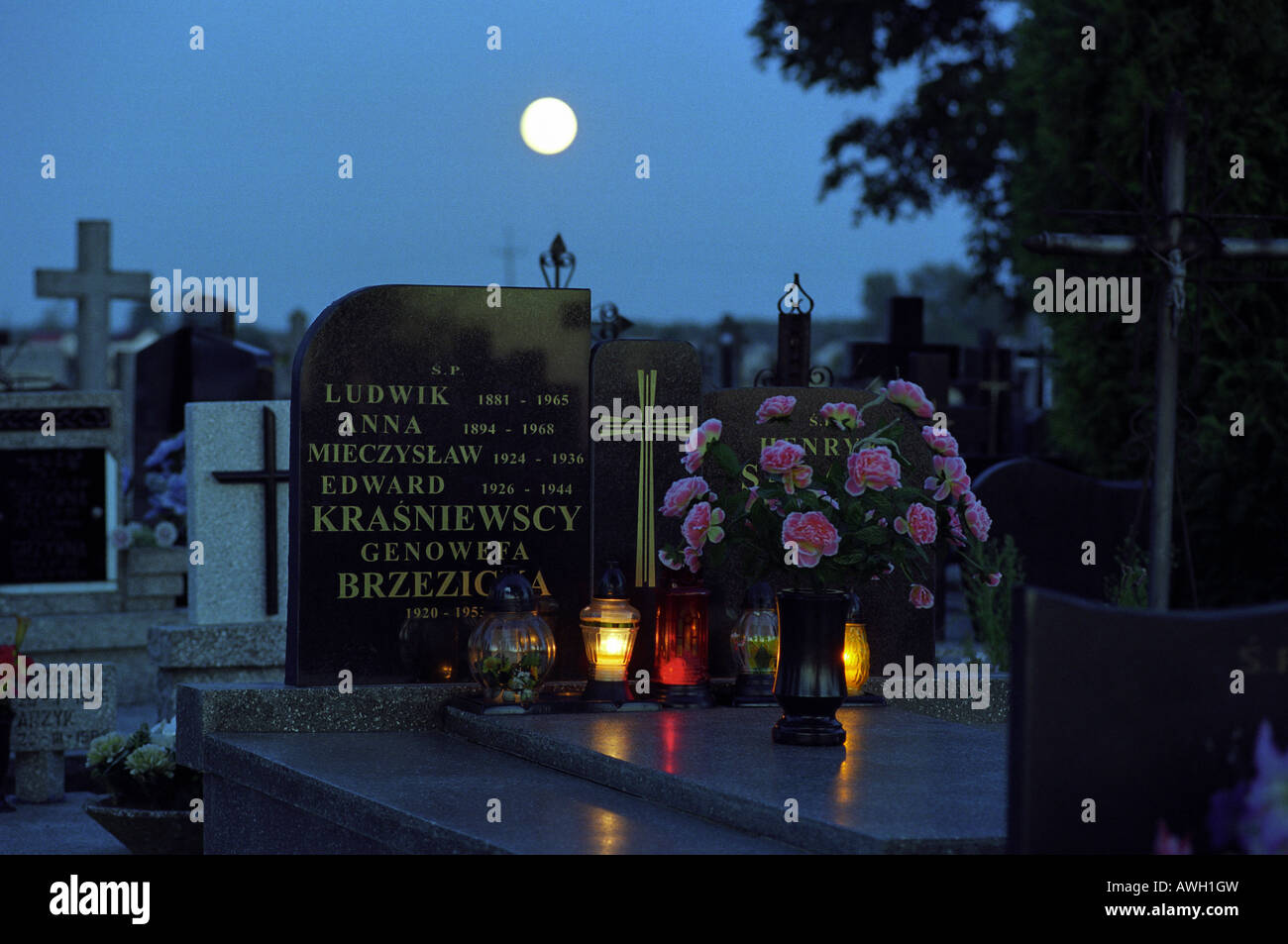 Gravestones on a graveyard at night, Drobin, Poland Stock Photo - Alamy