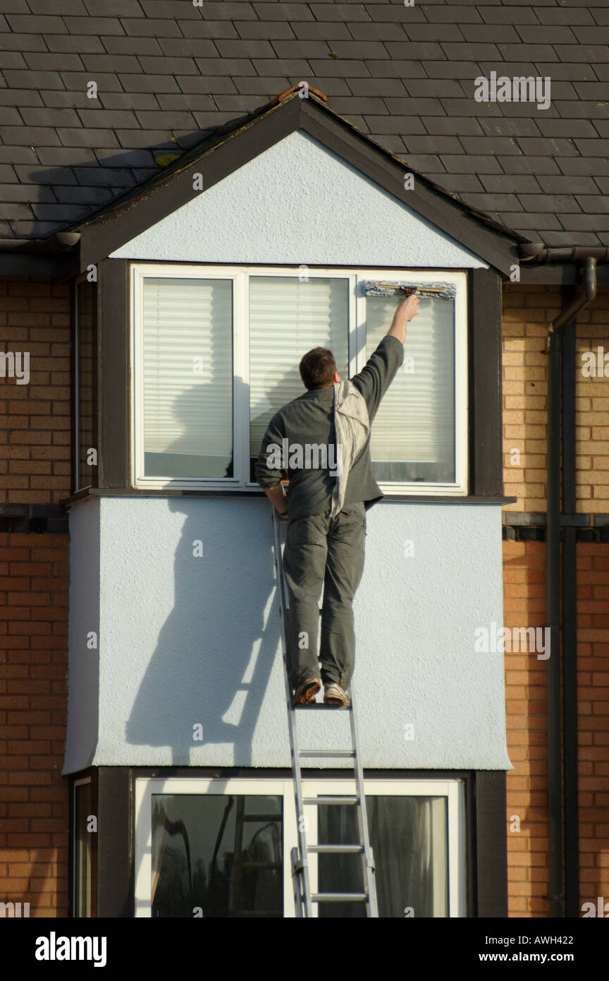 Ladder wash windows hi-res stock photography and images - Alamy