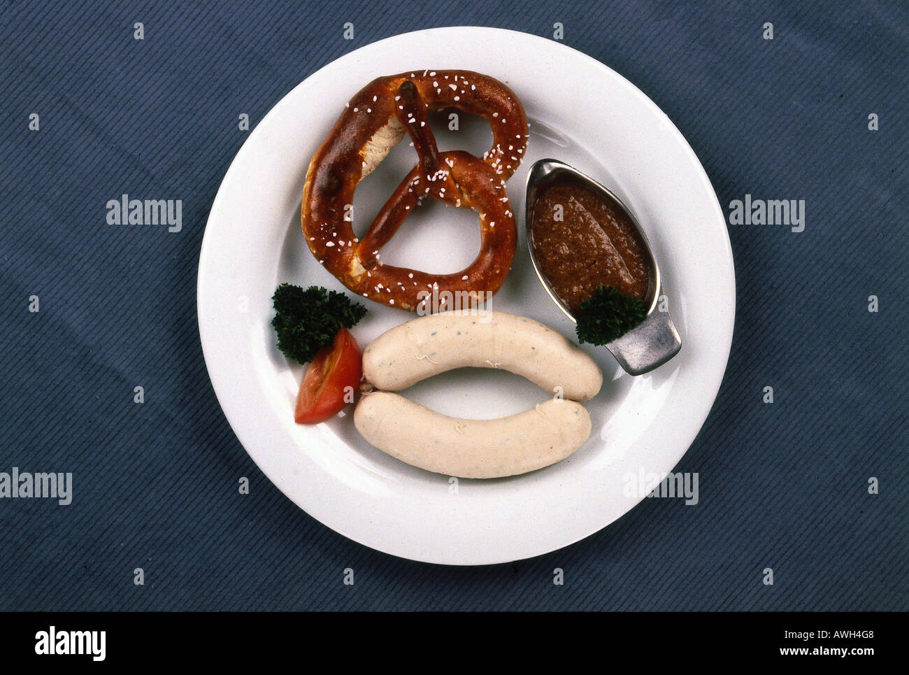 Germany, Bavaria, Weißwurst mit Süssem Senf, white sausage served with ...