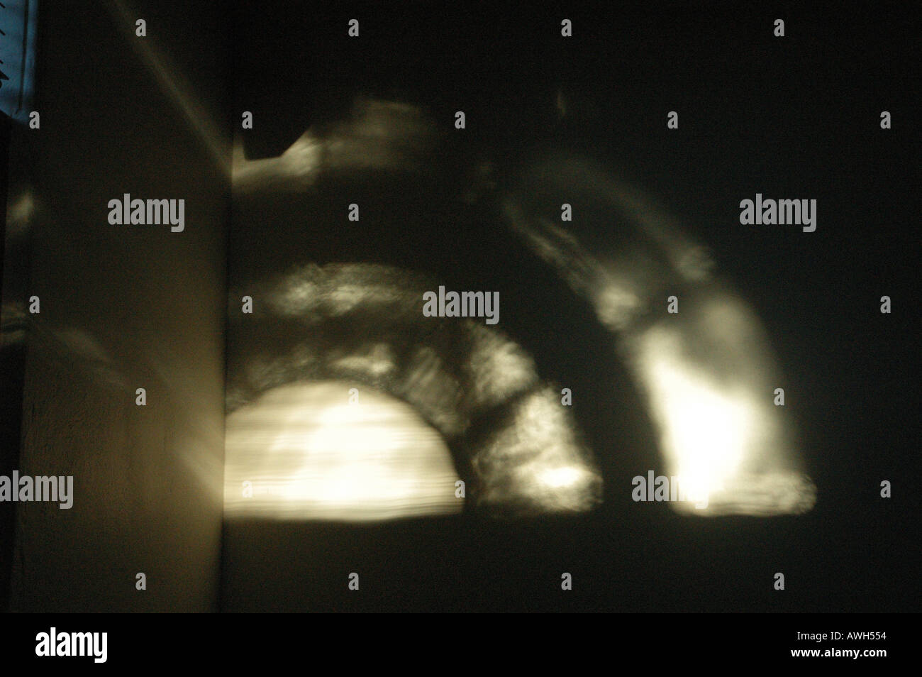 spooky shadows from old arched window dsc 7412 Stock Photo - Alamy