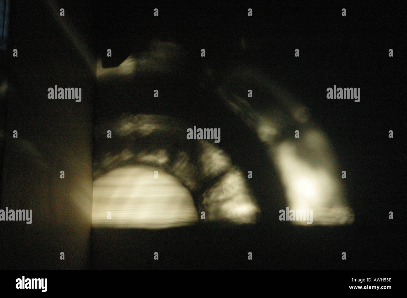 spooky shadows from old arched window dsc 7413 Stock Photo - Alamy
