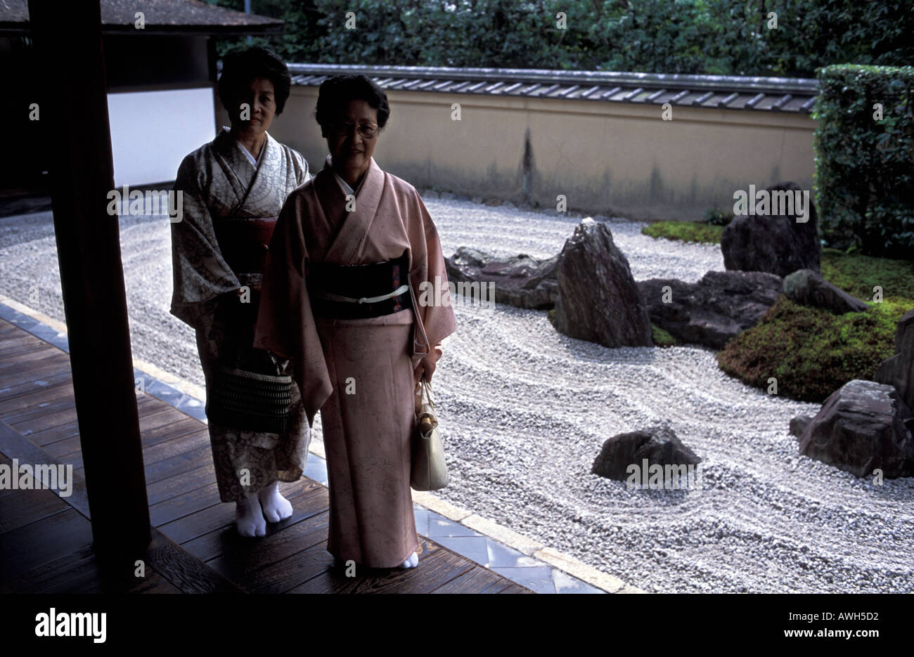 Japanese women in Kimono in Zuiho in Temple with Zen Garden behind ...