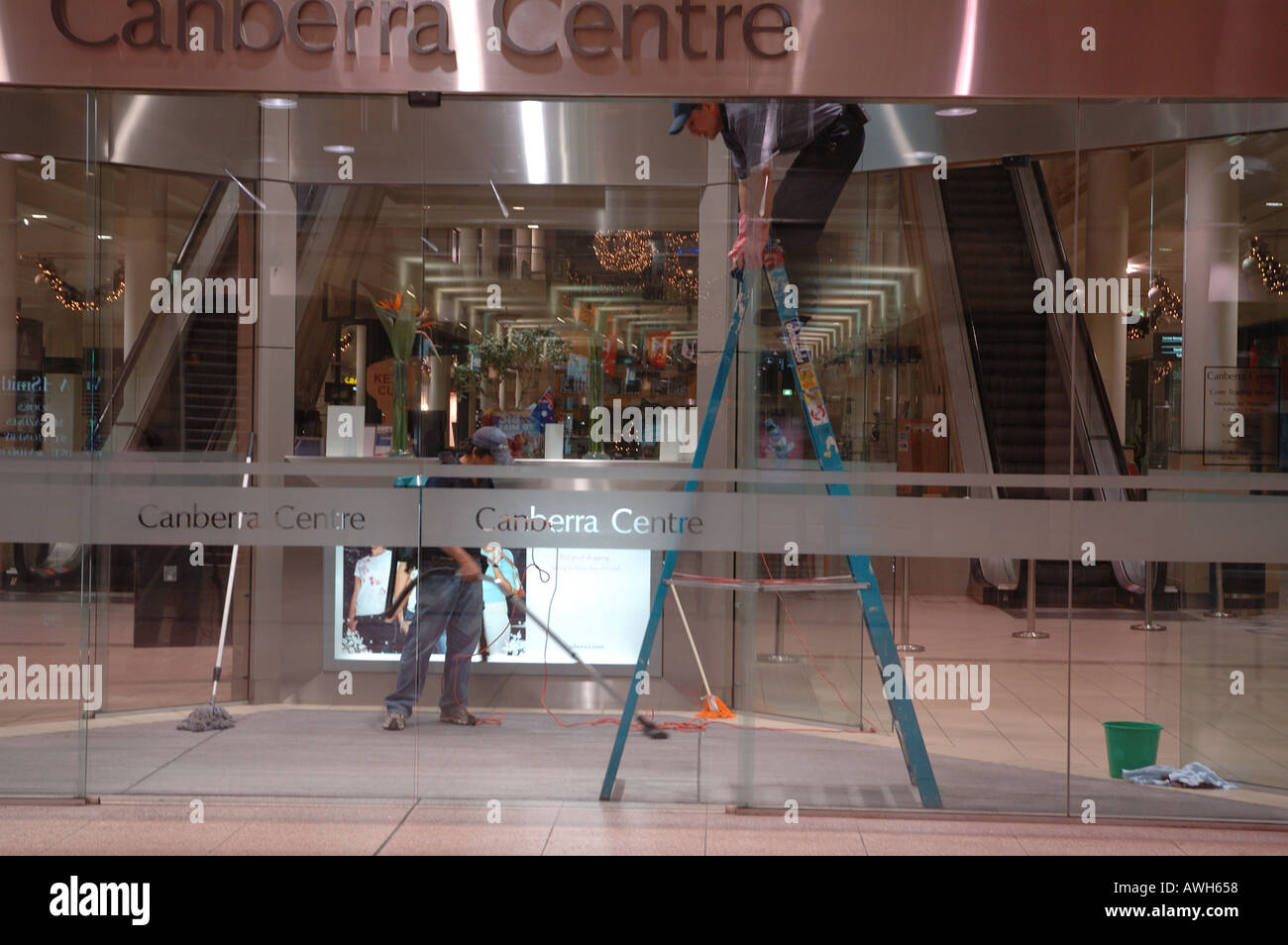 Maintainance crew work on department store at night dsc 7728 Stock ...