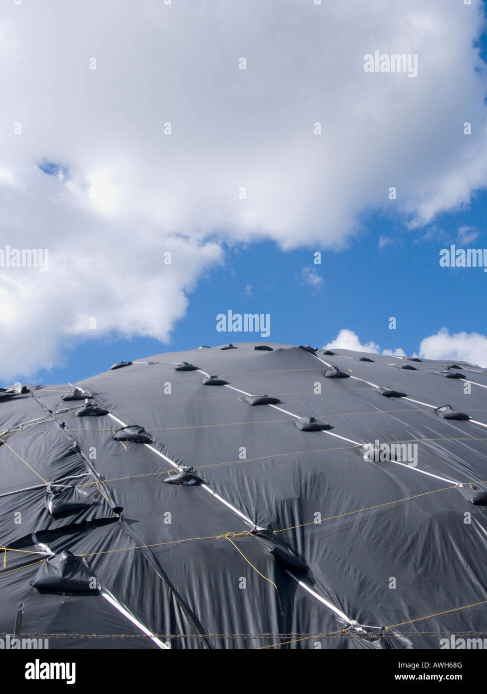 Salt for highway use in winter piles up under plastic tarps in ...