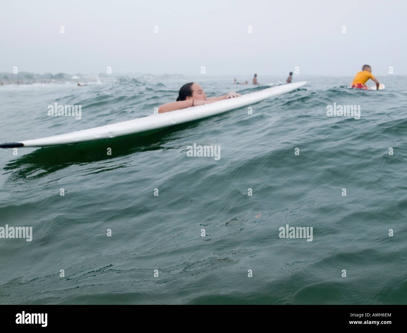 Teenage girls surf in Narragansett Rhode Island Stock Photo - Alamy