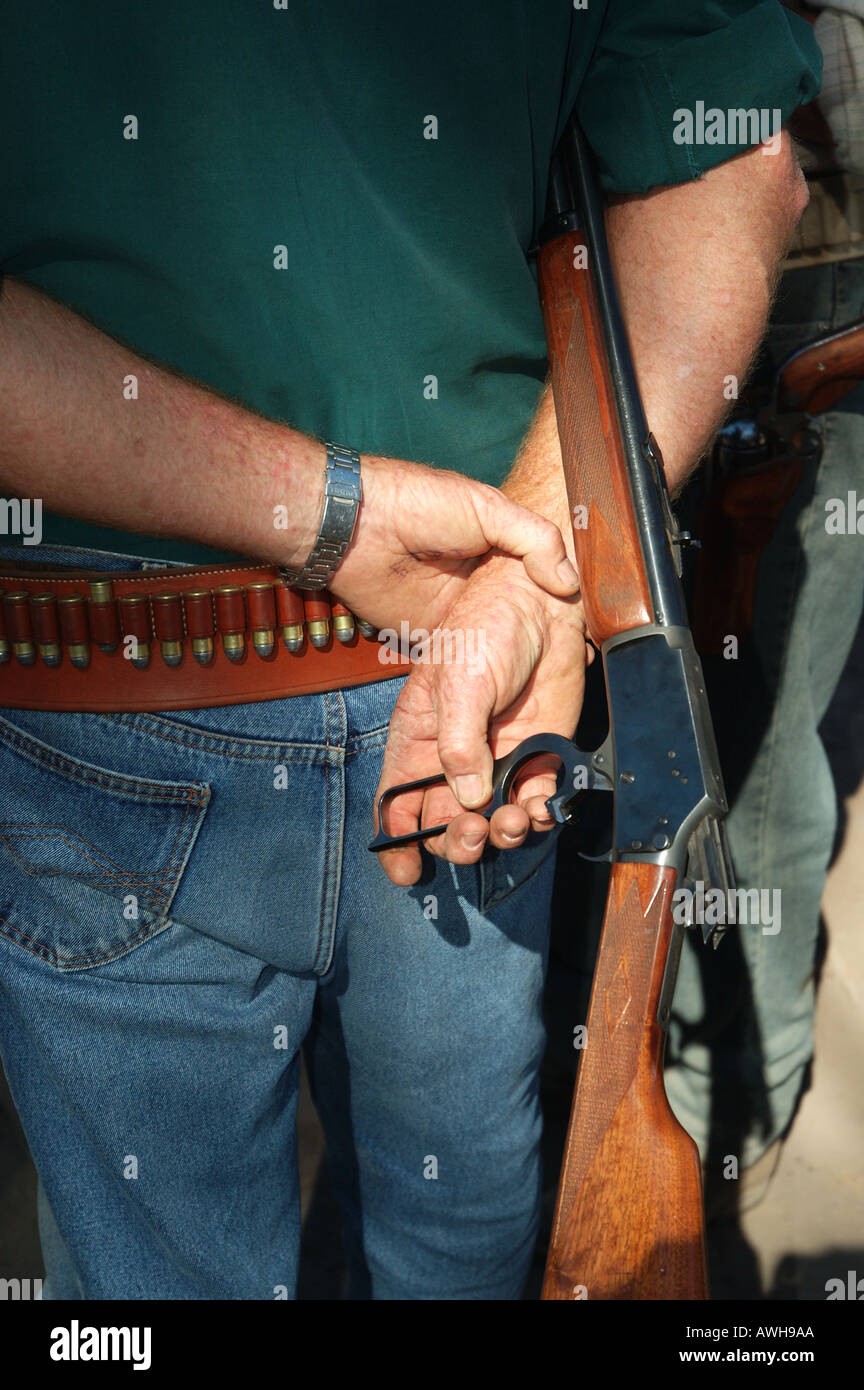lever action rifle slung resting in hands arms dsc 2810 Stock Photo - Alamy