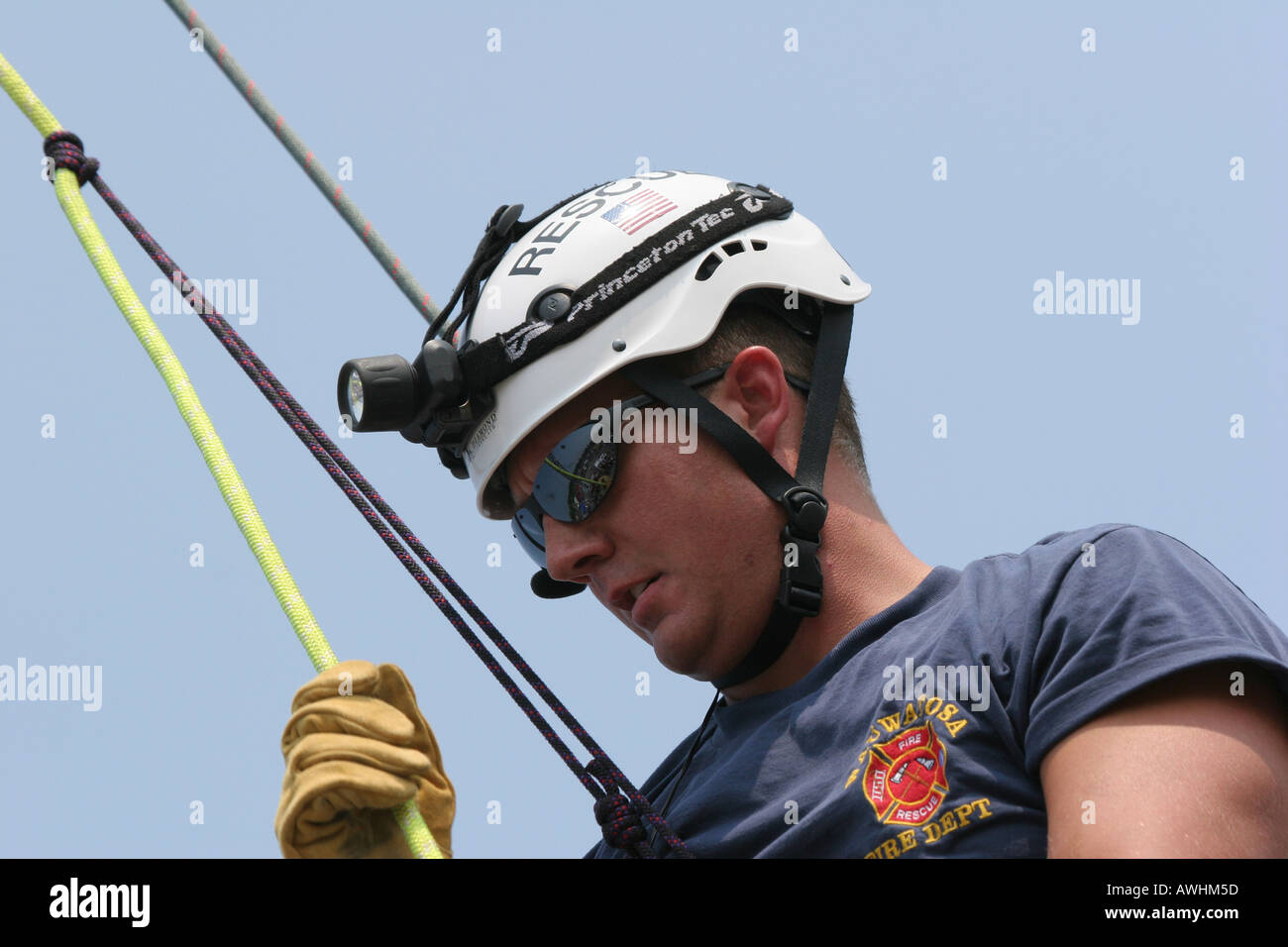 Wauwatosa Fire Department fire fighter climbing arial ropes Stock Photo ...